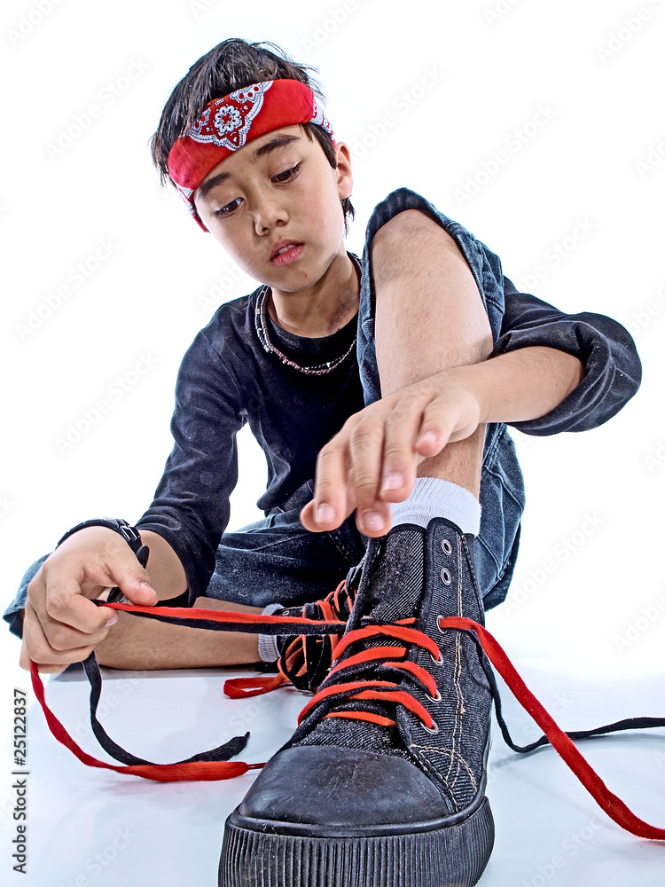 boy tying his shoe laces isolated on white background Stock Photo ...