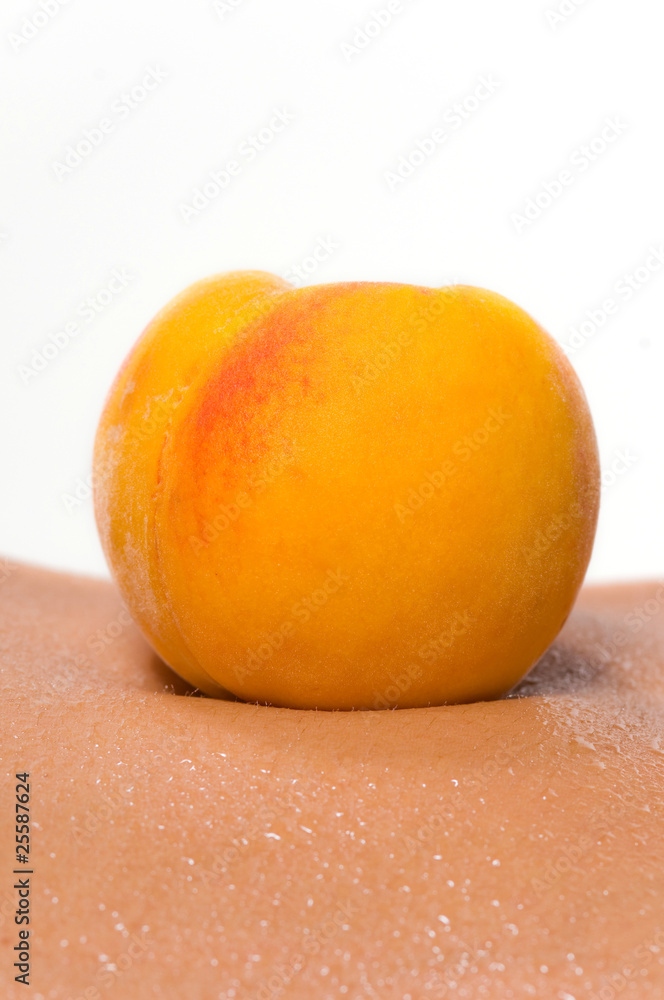 peach lies at the female body Stock Photo | Adobe Stock