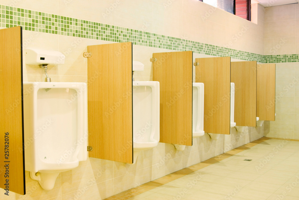 modern restroom interior with urinal row Stock Photo | Adobe Stock