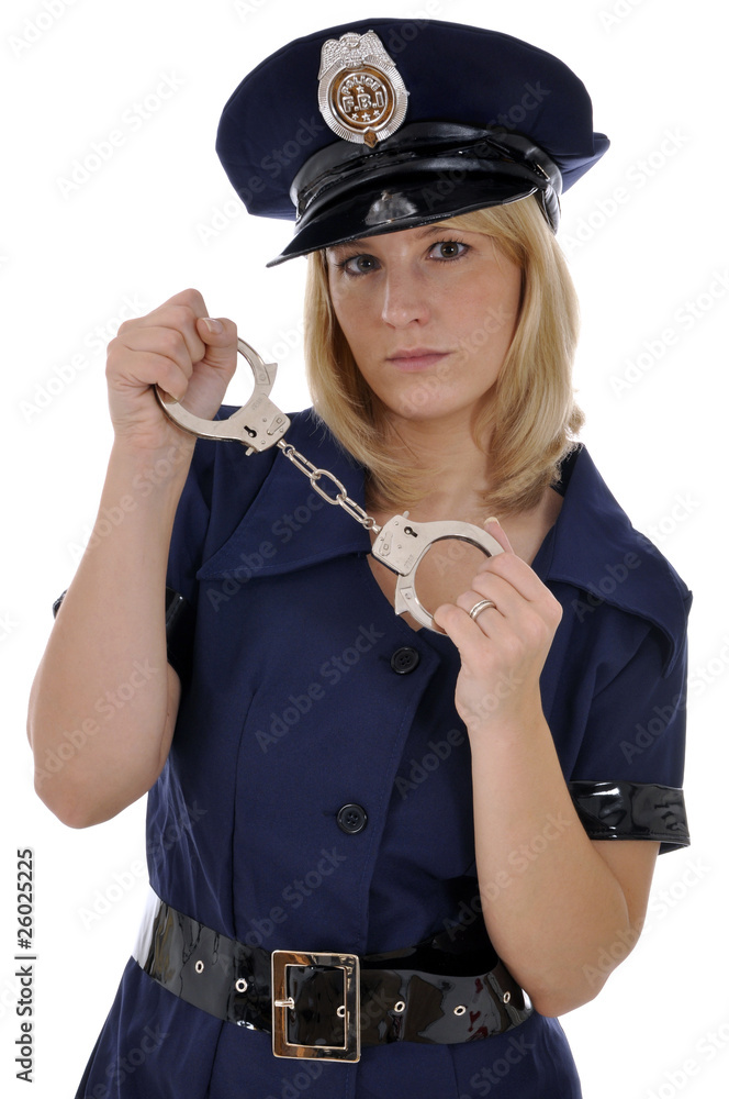 Polizistin mit Handschellen Stock-Foto | Adobe Stock