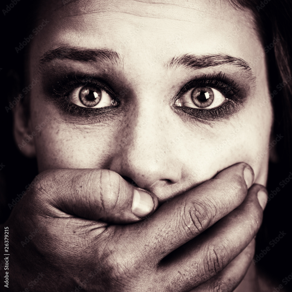 Scared woman victim of domestic violence and abuse Stock Photo | Adobe ...