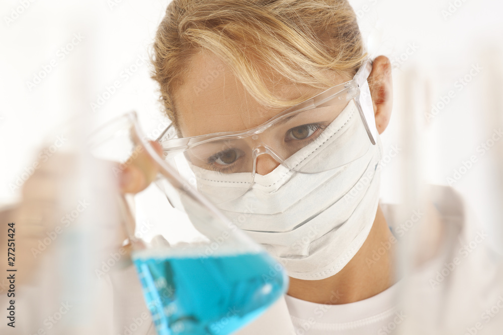 Close-up of scientist holding beaker Stock Photo | Adobe Stock