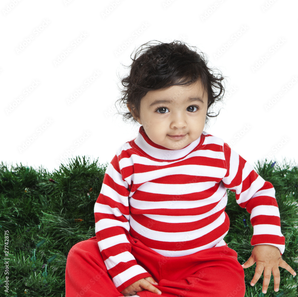 Cute Baby Girl Dressed in Red in front of a Christmas Background Stock ...