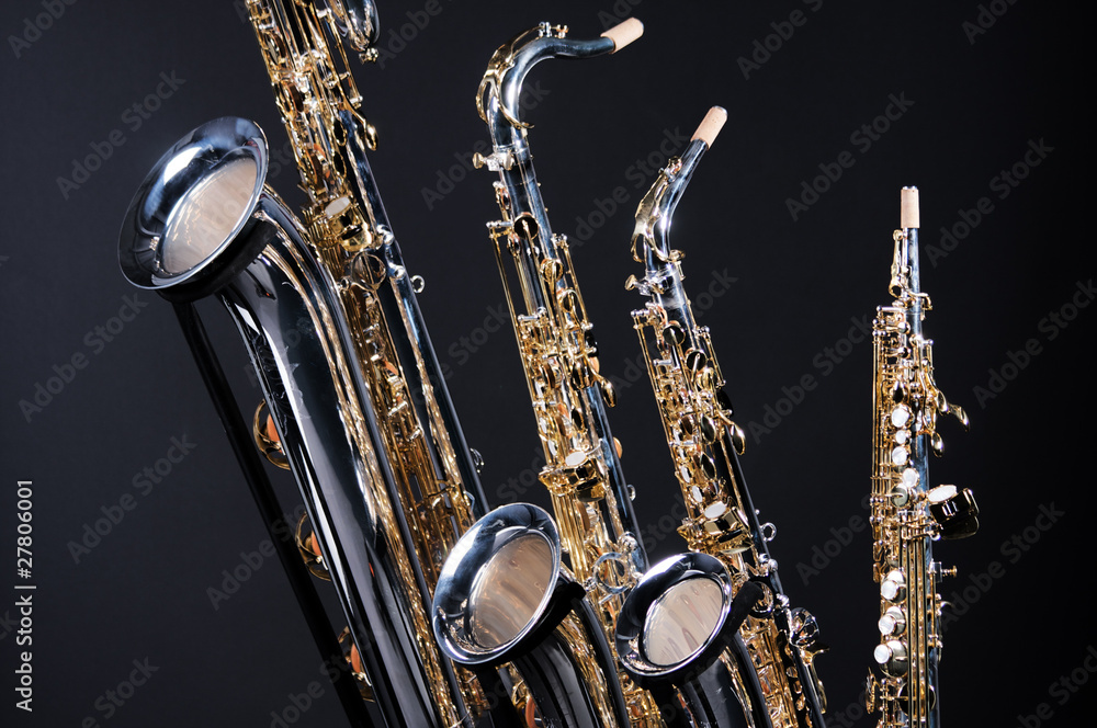Saxophones Set of Four Isolated on black Stock 写真 | Adobe Stock