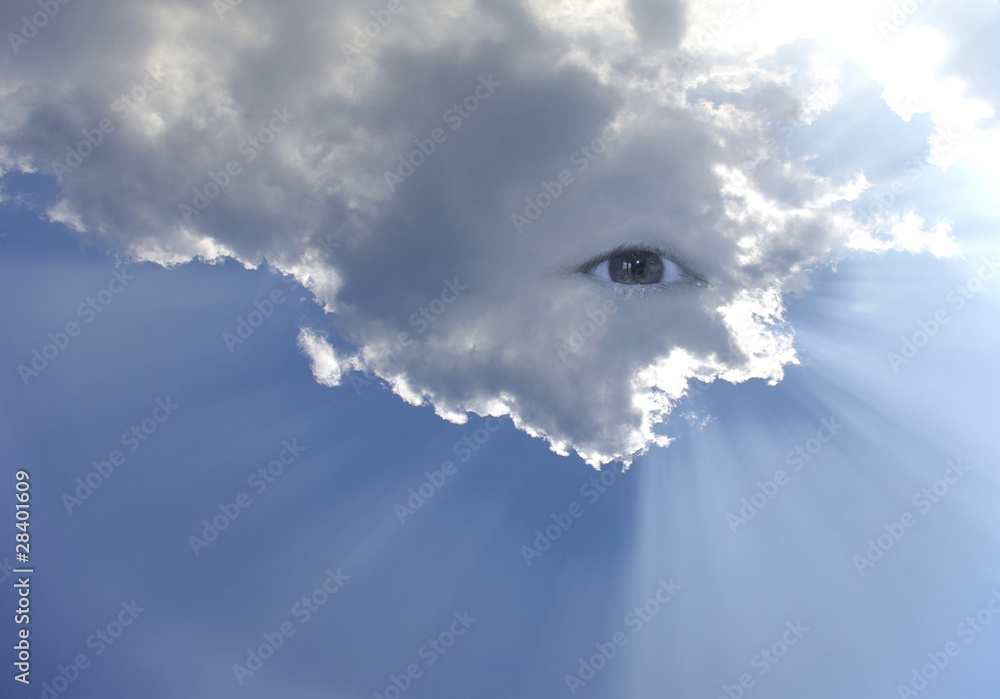 Big eye in the sky with lot of rays of light through clouds Stock Photo ...