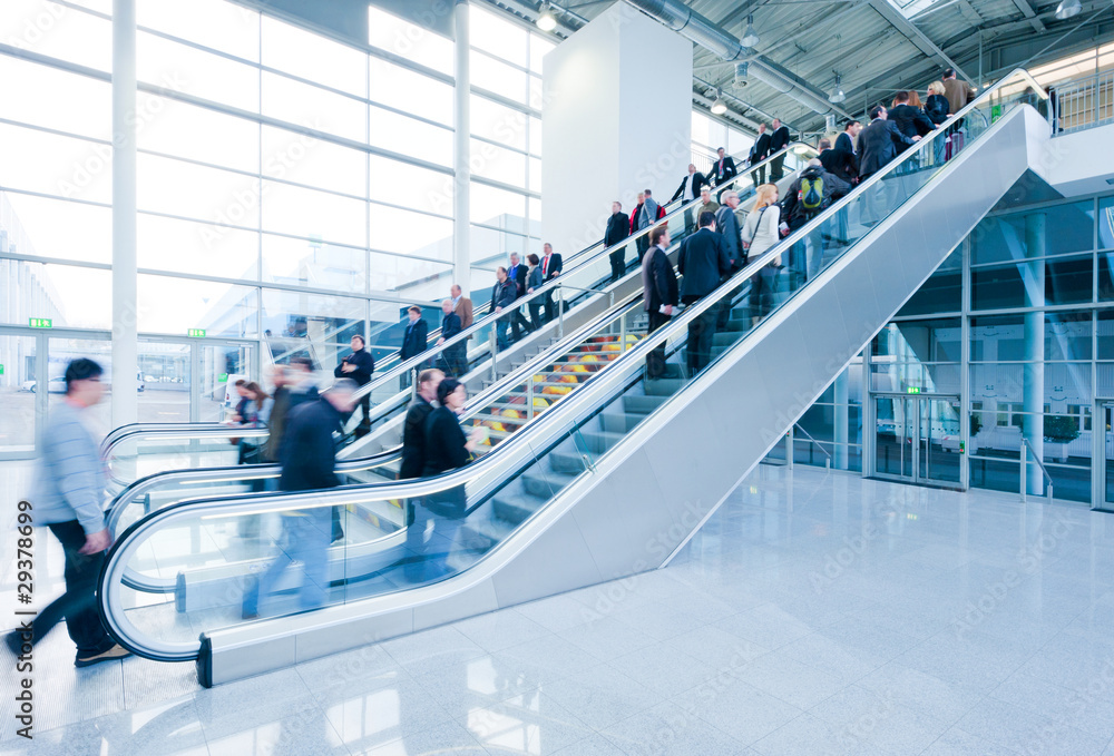trade fair visitors using a staircase Stock Photo | Adobe Stock