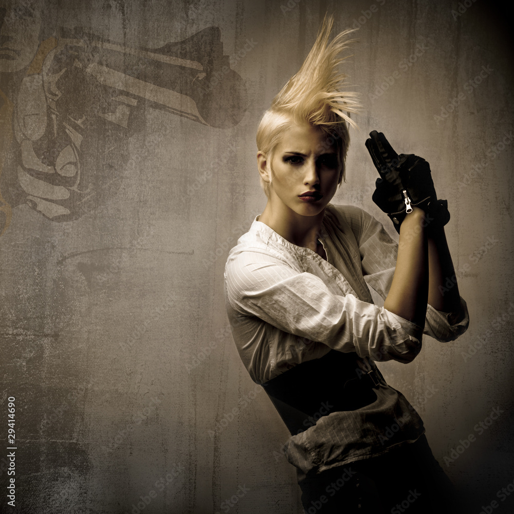 acttractive blond girl with gun Stock Photo | Adobe Stock