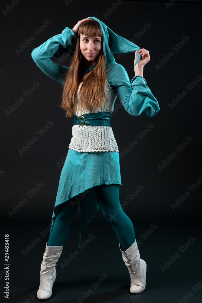 beautiful teen girl in blue dress with goblin hood Stock Photo | Adobe ...