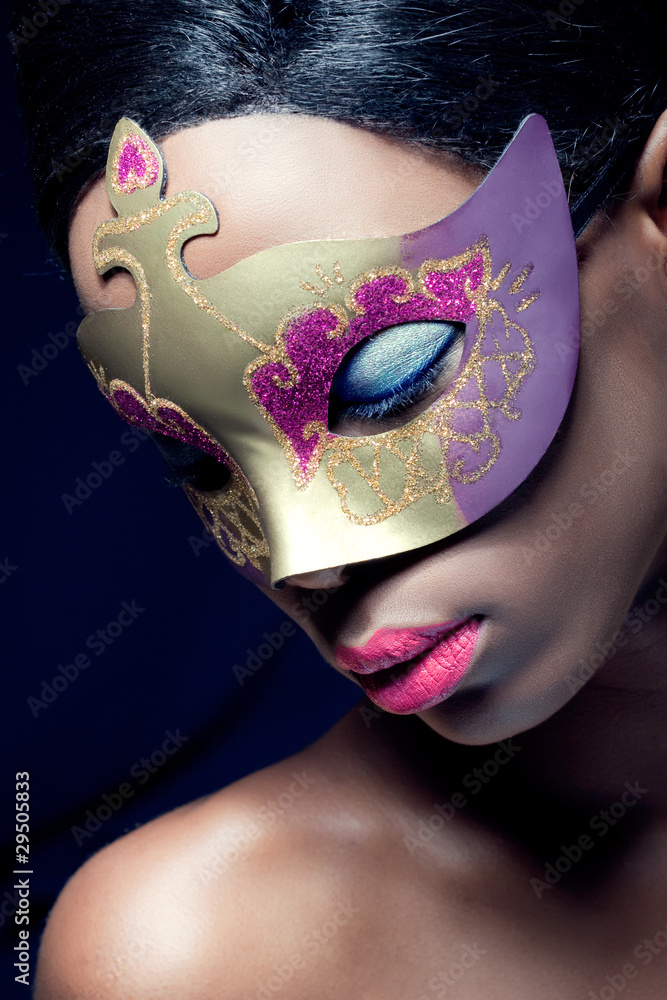 Beauty portrait of a young black woman wearing mask Stock Photo | Adobe ...