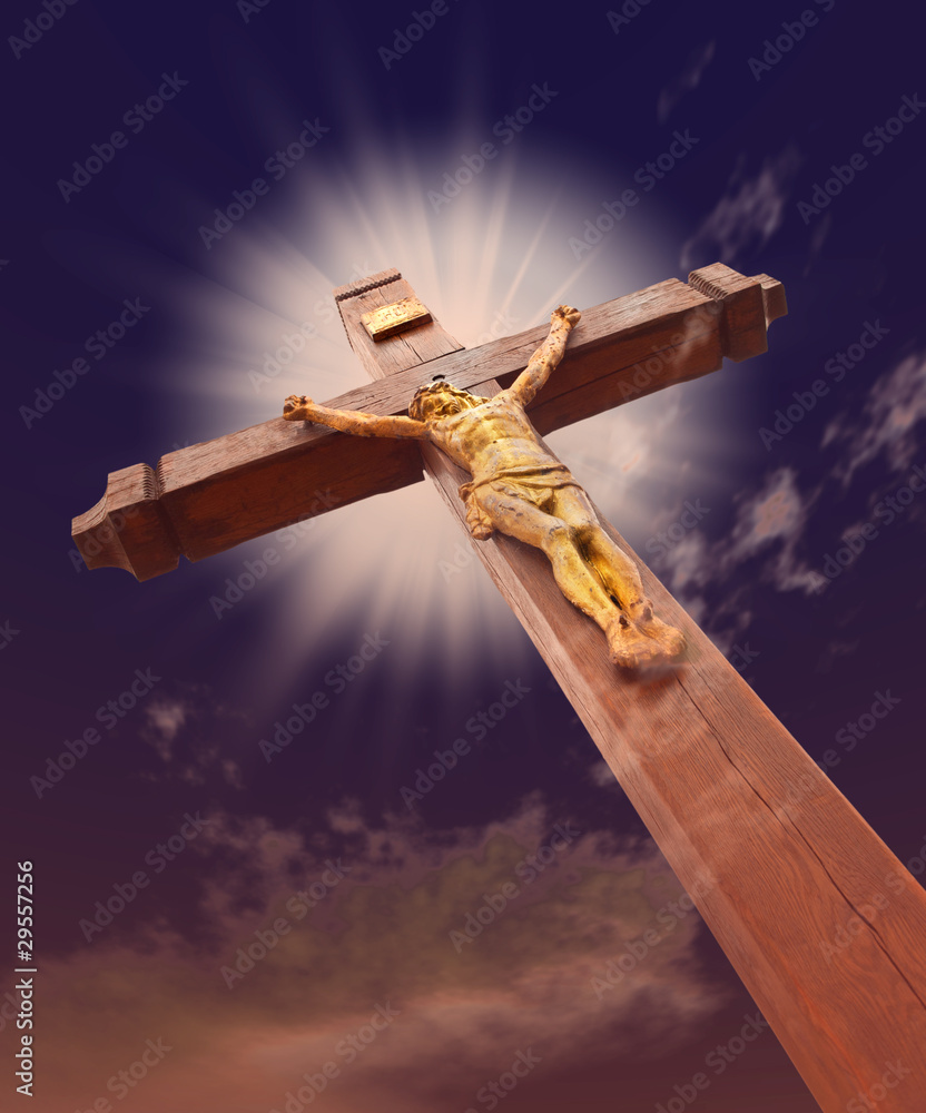 The crucifixion from a tree with Jesus's gilt figure Stock Photo ...