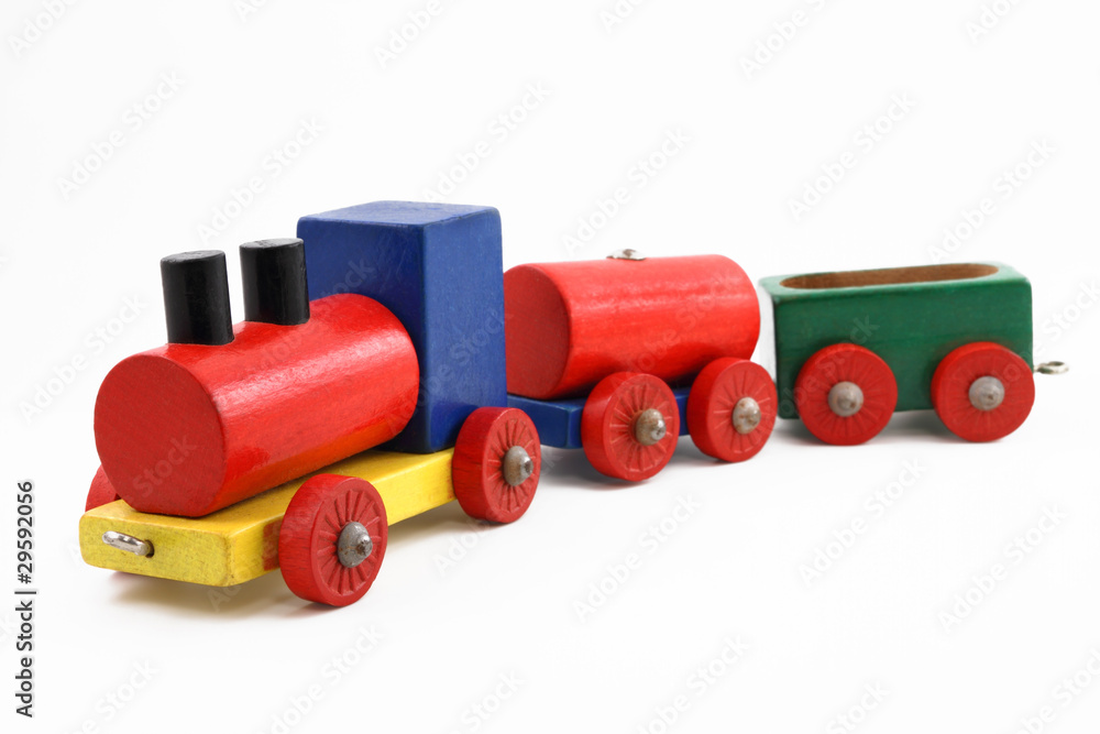 Colorful miniature wooden toy train on white background Stock Photo ...