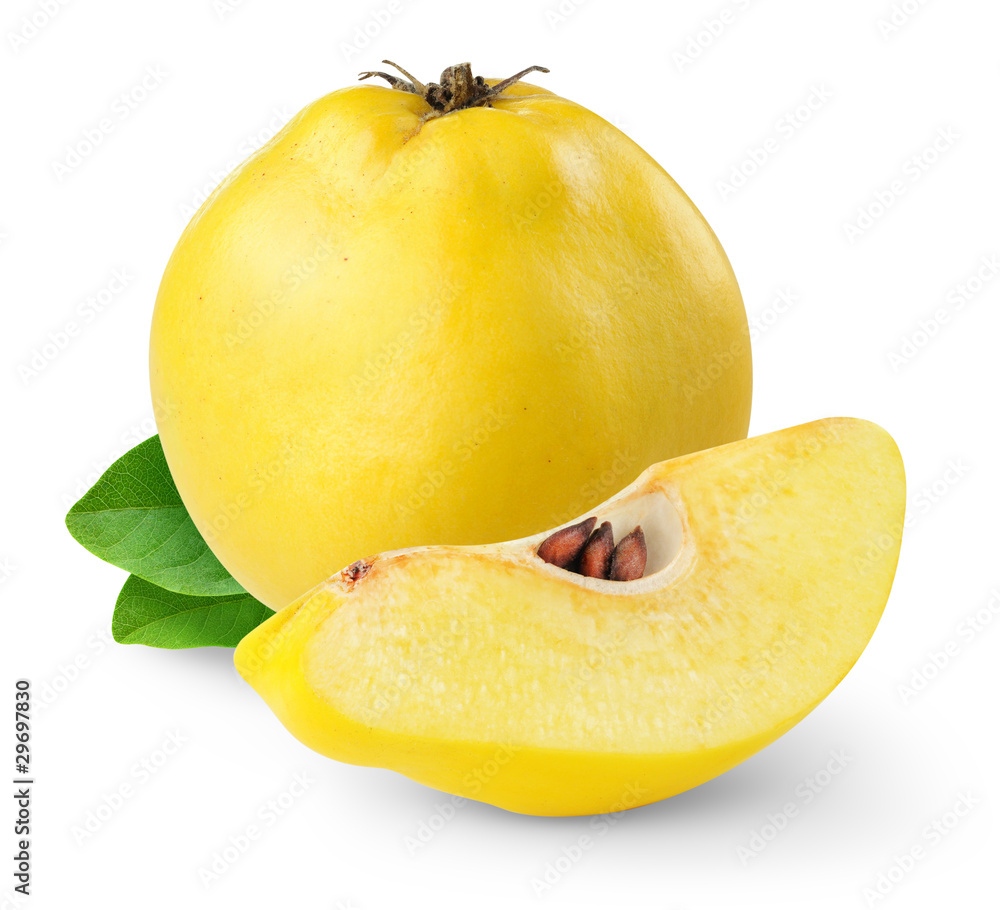 Isolated quince. One whole yellow quince fruit and a wedge isolated on ...