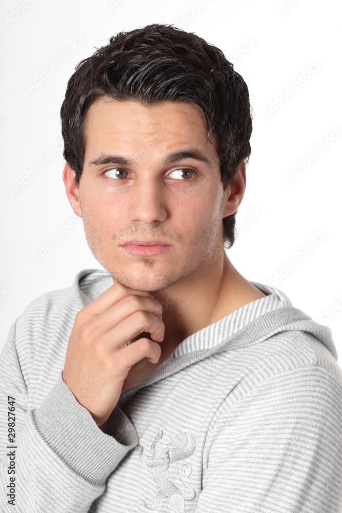 Junger Mann nachdenklich Stock-Foto | Adobe Stock