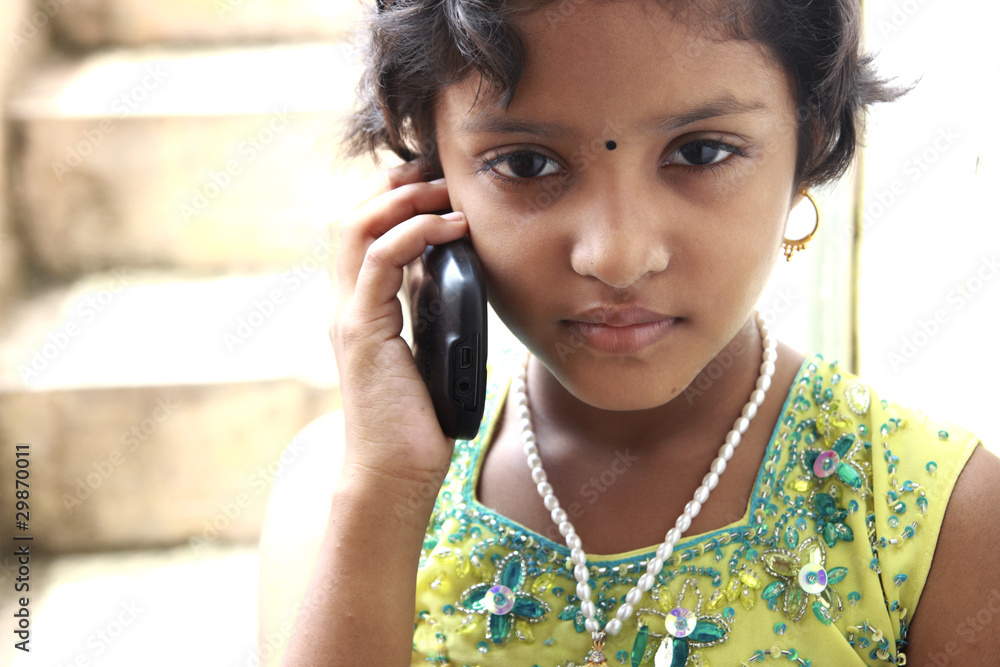 Indian Girl with Mobile Phone Stock Photo | Adobe Stock