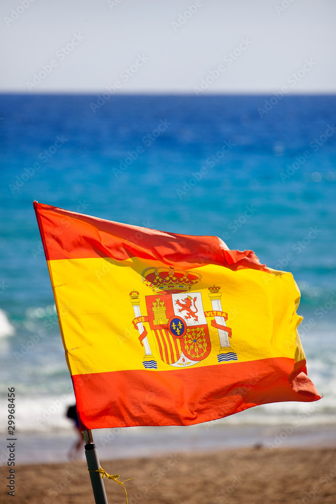 spanish flag at the beach Stock Photo | Adobe Stock