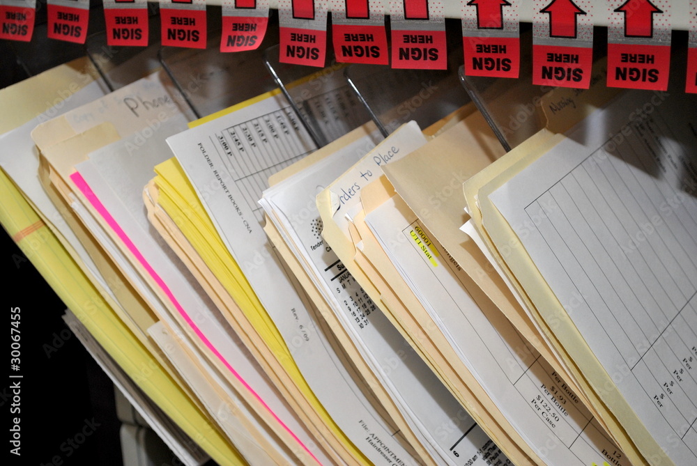 Office Files on a Shelf in an Office Stock Photo | Adobe Stock