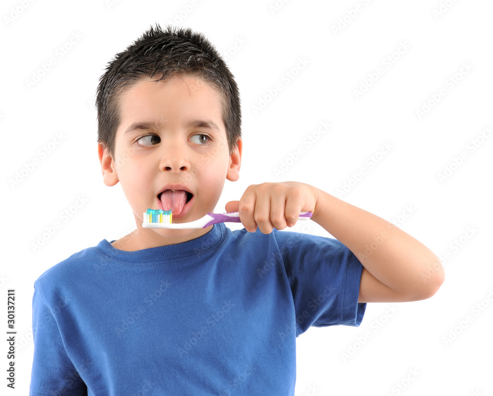 Cute boy brushing teeth isolated on white background. Stock Photo ...