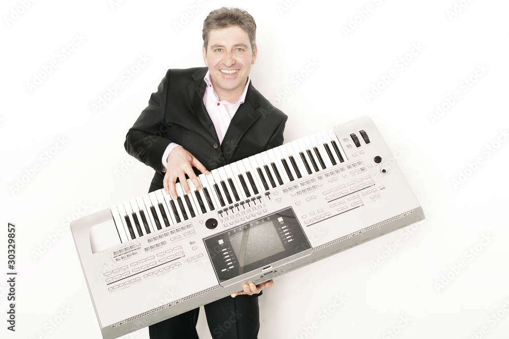 Musiker mit Keyboard Stock Photo | Adobe Stock
