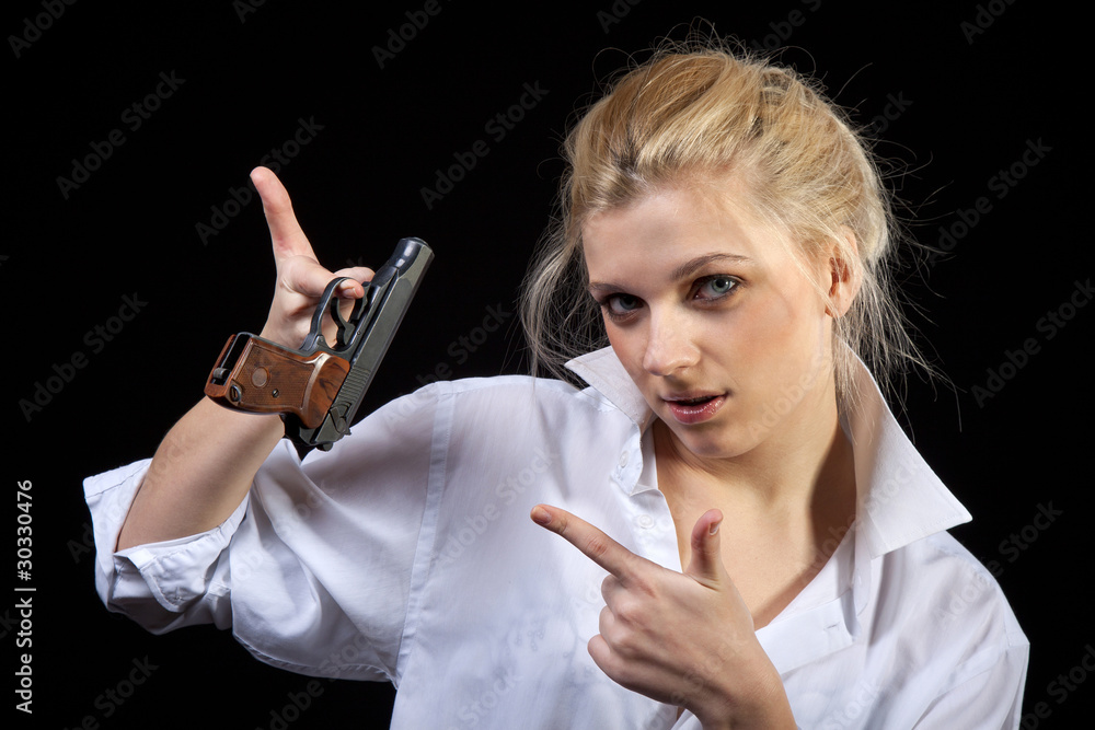 beautiful girl holding gun. Isolated Stock Photo | Adobe Stock
