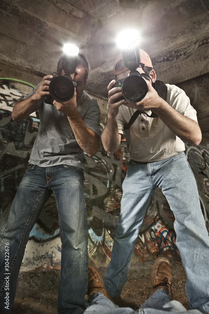 Paparazzi Photographers Shooting a Murder Victim Stock Photo | Adobe Stock