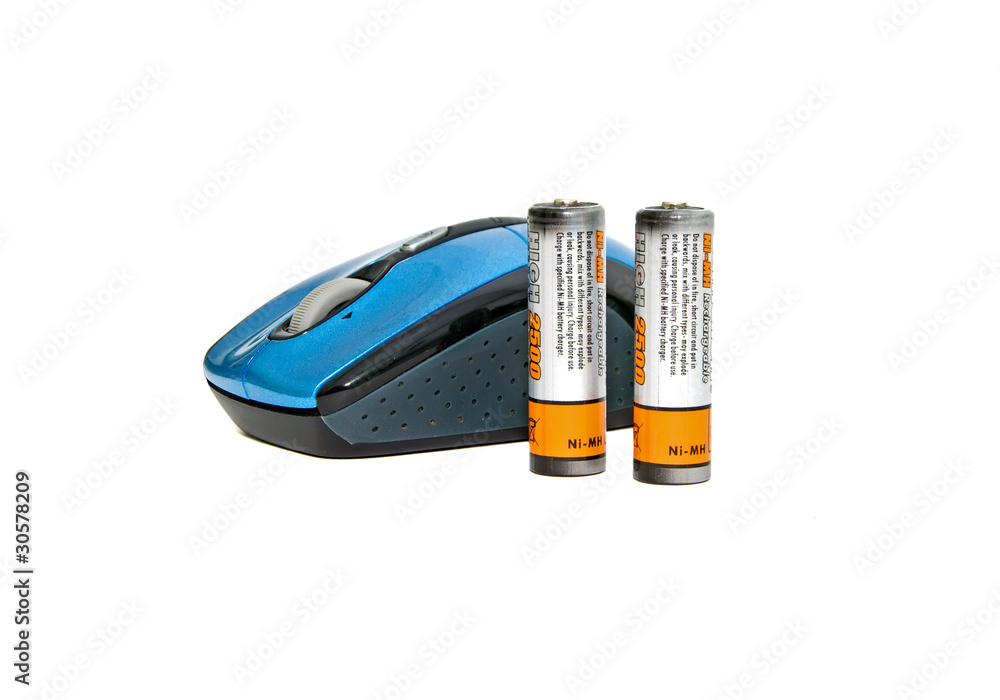 computer mouse and the battery on a white background. Stock Photo ...