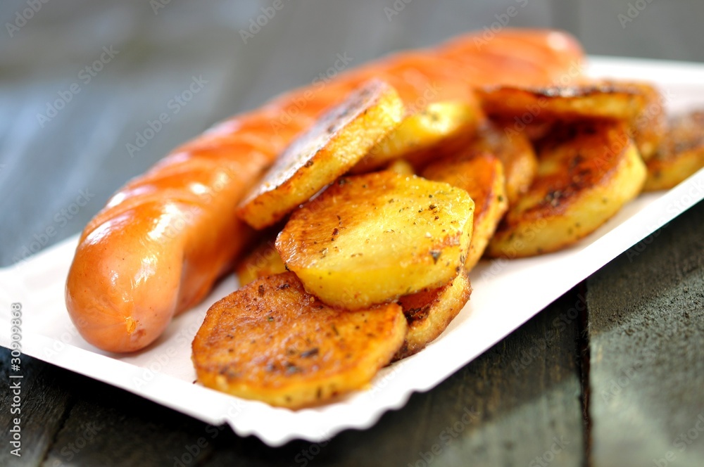 Grillwurst mit Bratkartoffeln Stock Photo | Adobe Stock