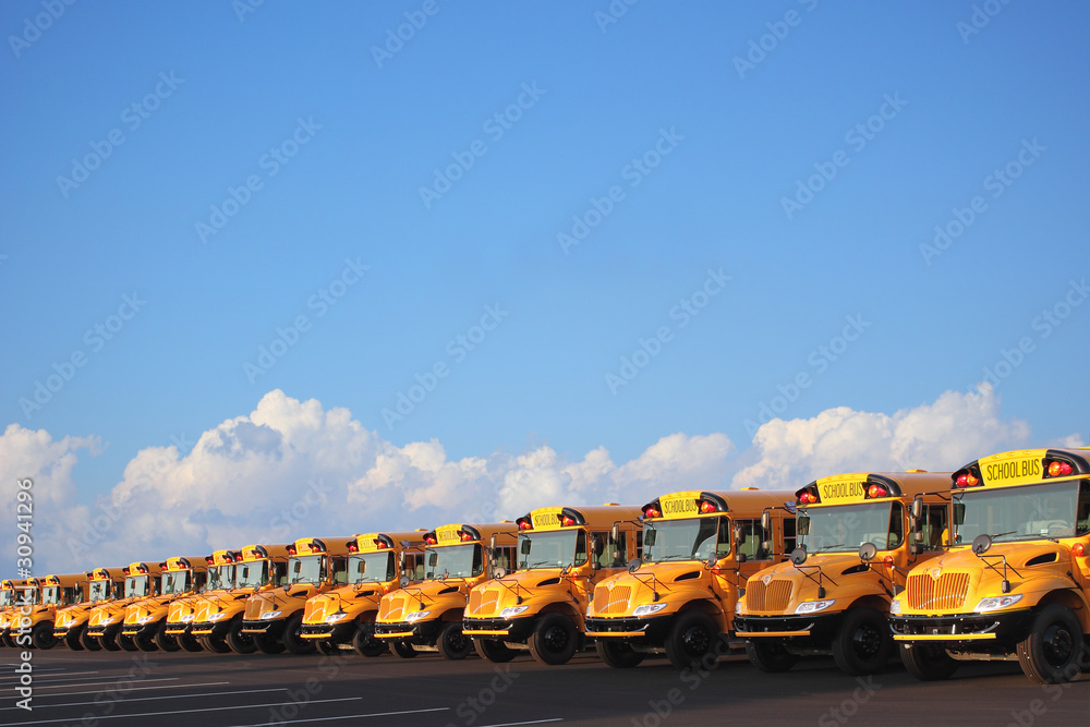 Row of School Buses Stock Photo | Adobe Stock