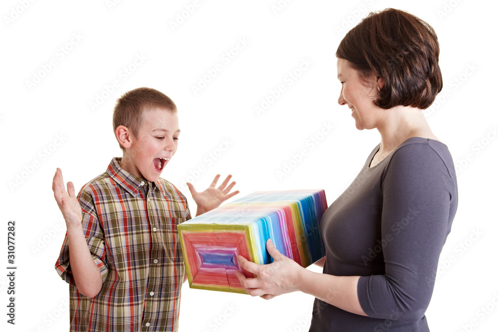 Kind freut sich über ein Geschenk Stock Photo | Adobe Stock