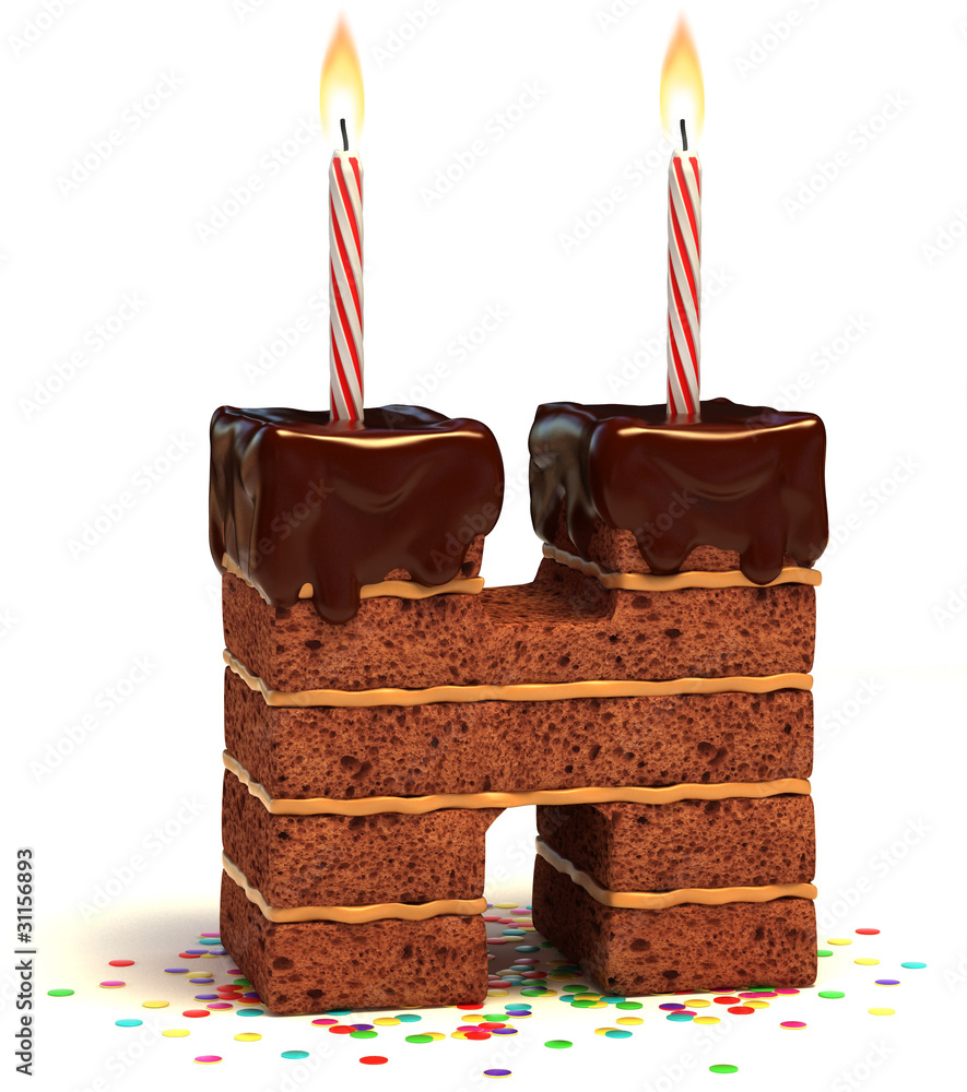 letter H shaped chocolate birthday cake with lit candle Stock ...