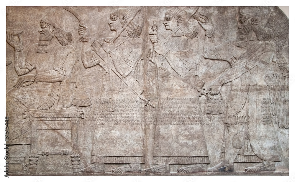 Ancient relief of assyrian winged gods and archers Stock Photo | Adobe ...
