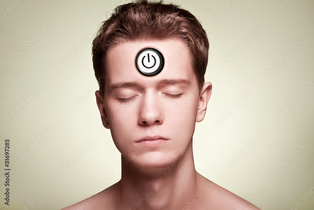 power button switch in the forehead. Stock Photo | Adobe Stock