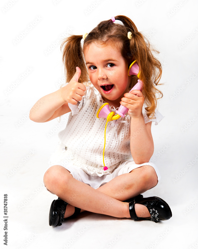 Kind telefonieren Stock-Foto | Adobe Stock