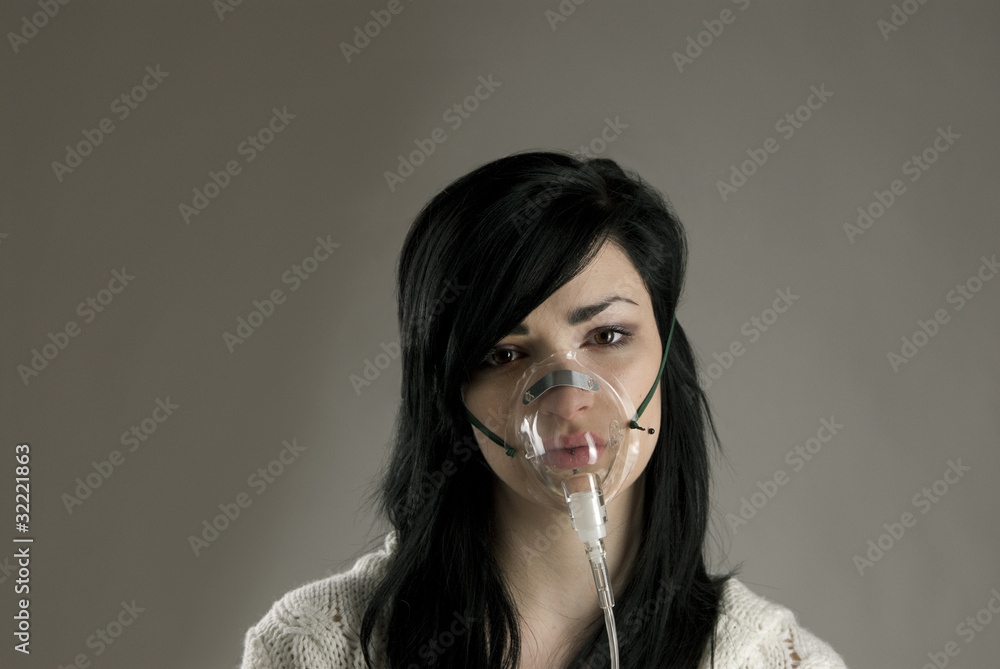 girl with oxygen mask Stock Photo | Adobe Stock