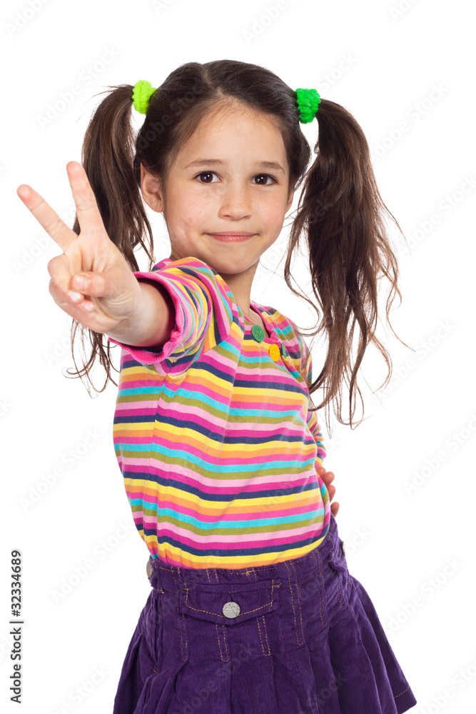 Little girl with victory sign Stock Photo | Adobe Stock