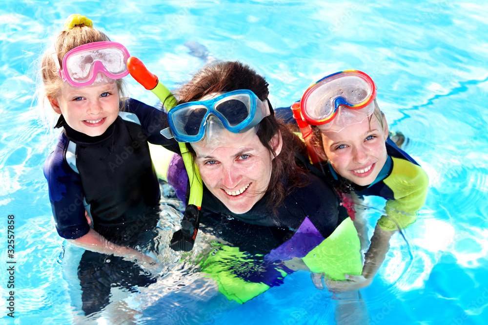 Children in swimming pool learning snorkeling. Stock Photo | Adobe Stock