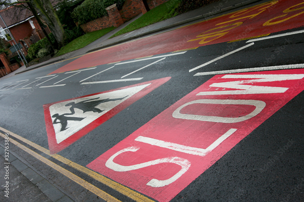 Road sign, slow Stock Photo | Adobe Stock