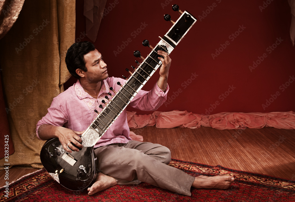 Handsome Sitar Player Stock Photo | Adobe Stock