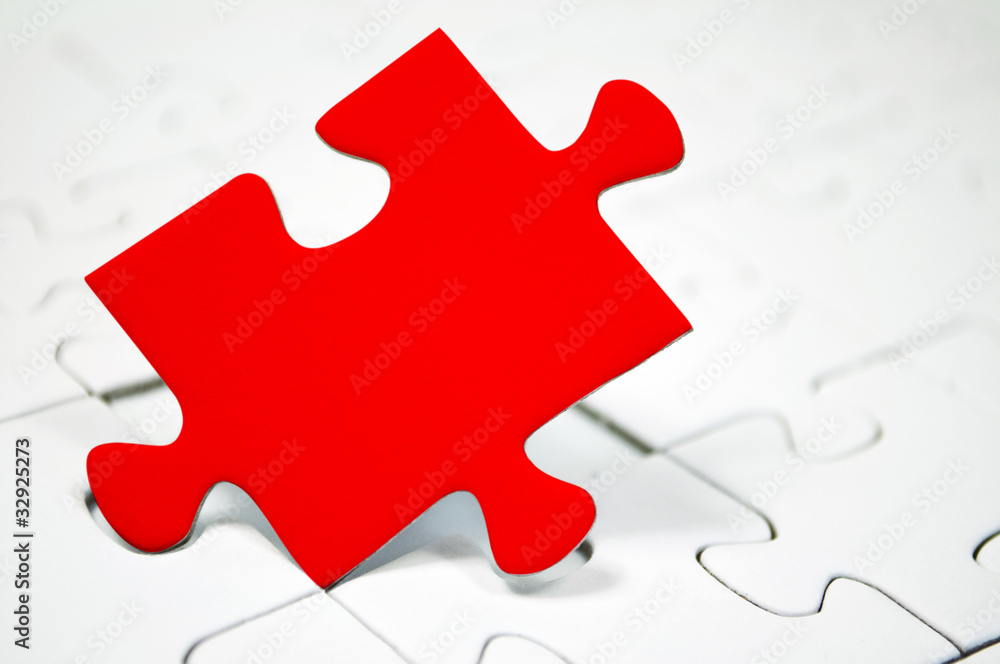 Puzzleteil rot Stock-Foto | Adobe Stock