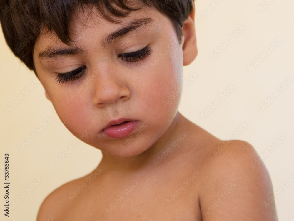 Foto Stock viso di bambino | Adobe Stock