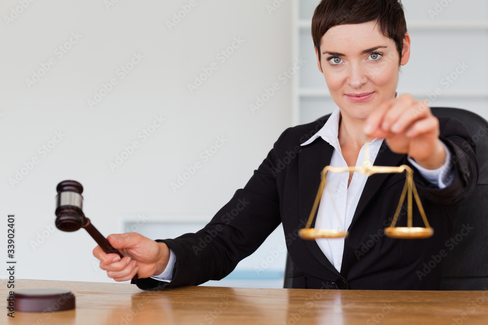 Judge with a gavel and the justice scale Stock Photo | Adobe Stock