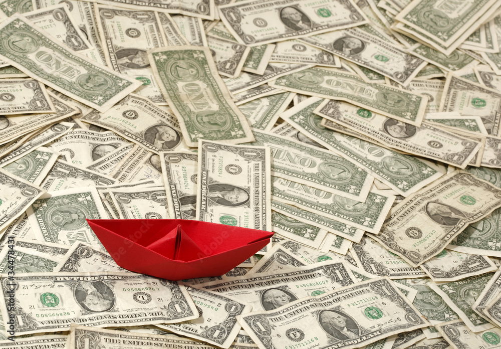 Ship is sailing on sea of money Stock Photo | Adobe Stock