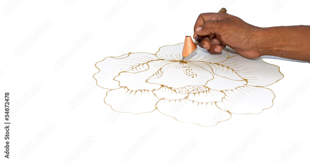 hand while drawing malaysian batik Stock Photo | Adobe Stock