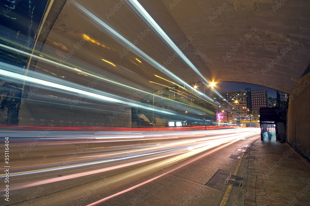 blurred bus light trails in downtown night-scape Stock Photo | Adobe Stock