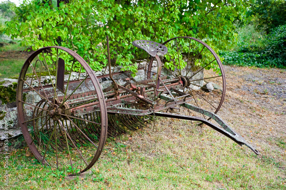 historical farm machine Stock Photo | Adobe Stock