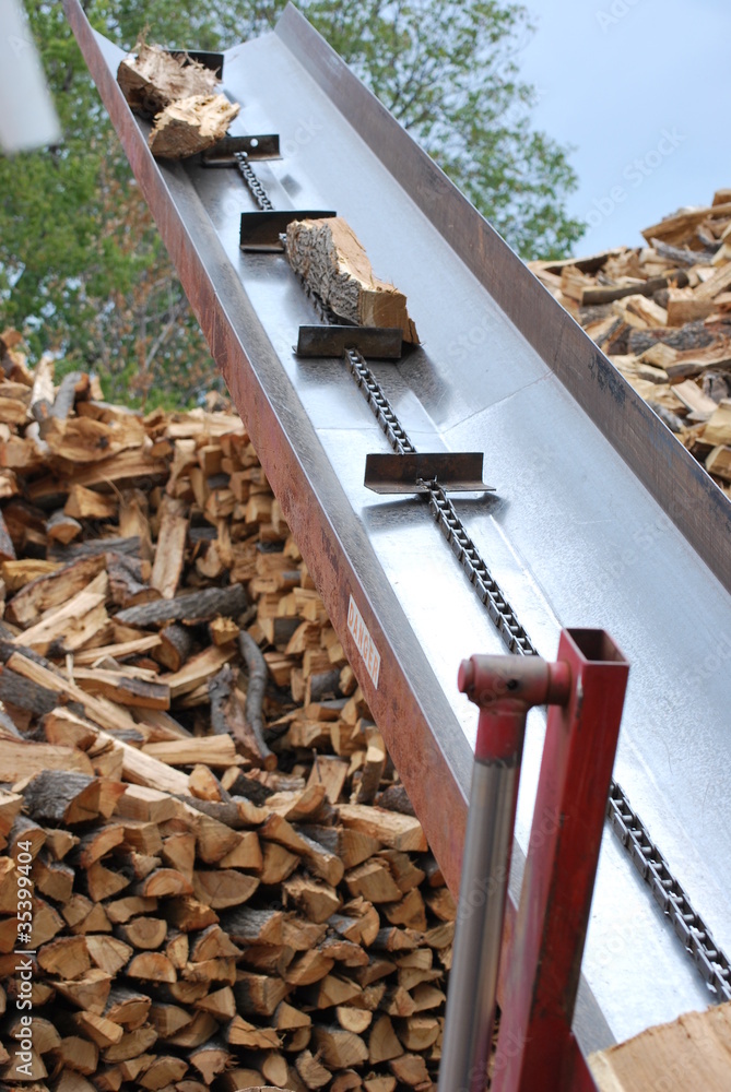 Fire Wood Conveyor Stock Photo | Adobe Stock