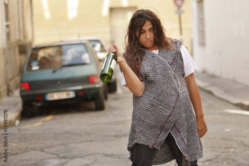 drunk woman walking in street Stock Photo | Adobe Stock