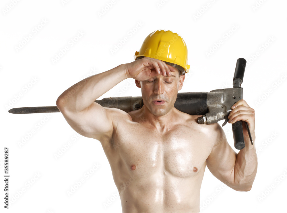 Obrero agotado después de trabajar foto de Stock | Adobe Stock