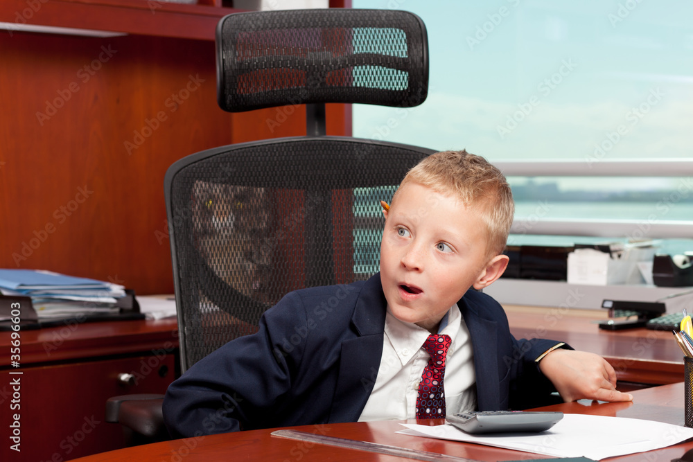 Cute goofy boy in business attire in an office Stock Photo | Adobe Stock