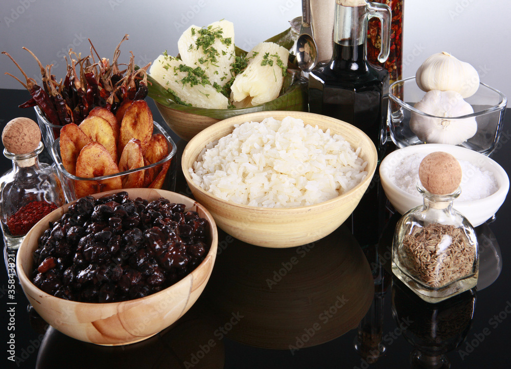 Staple latino sides, manioc, rice, plantains, and black beans Stock ...