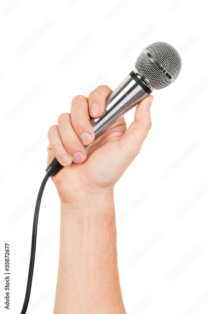 Hand with microphone Stock Photo | Adobe Stock